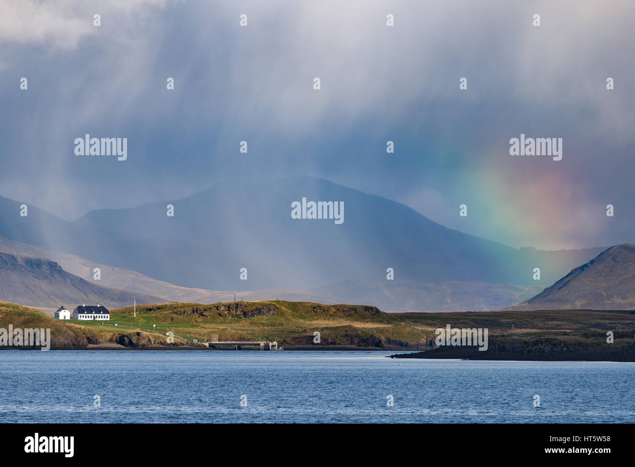 Rainbow and clouds over Videy island, Iceland Stock Photo - Alamy