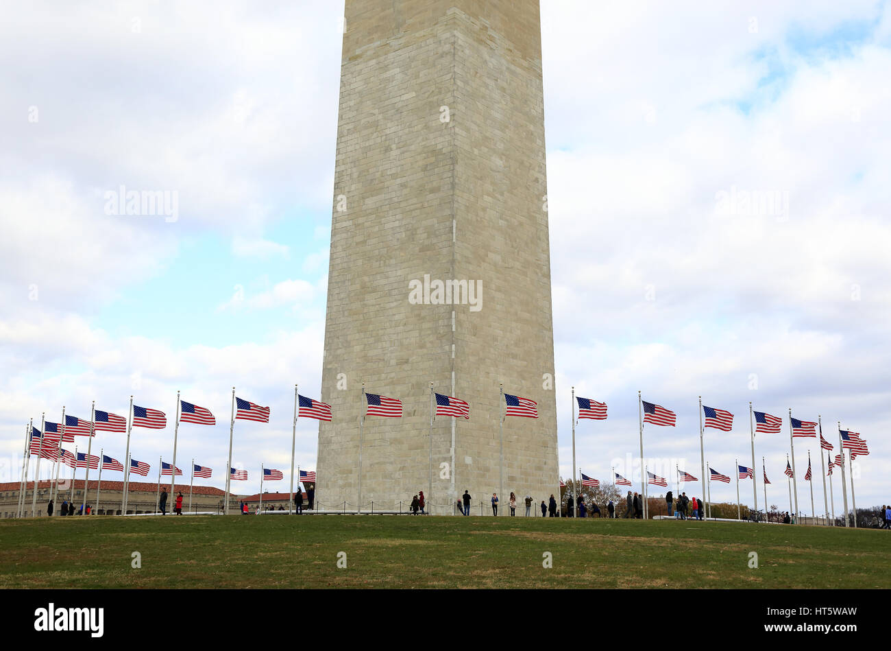 Washington Monument with US flags in National Mall in Washington D.C ...