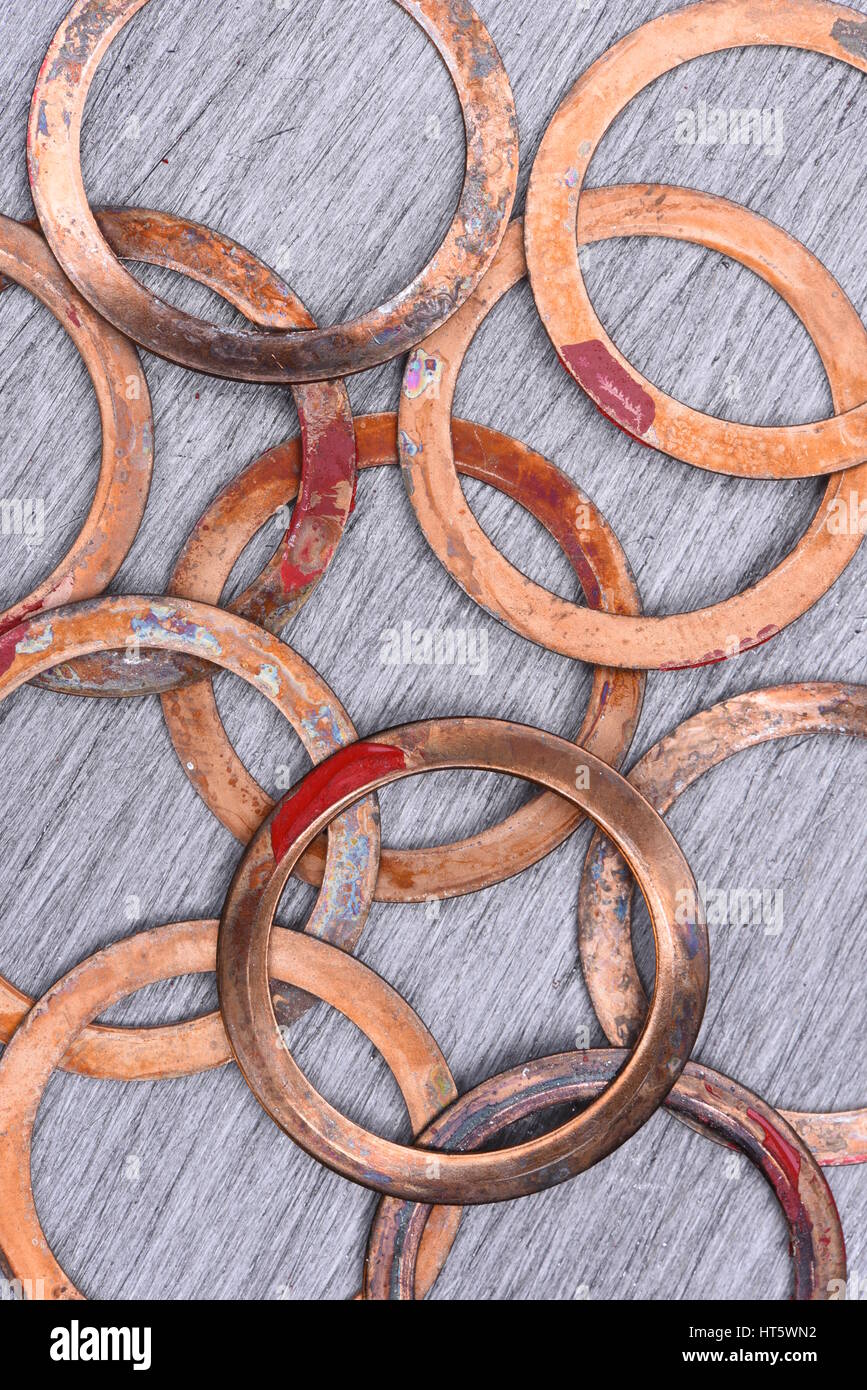Old Copper Washers on Metal Background, Top View Stock Photo - Alamy
