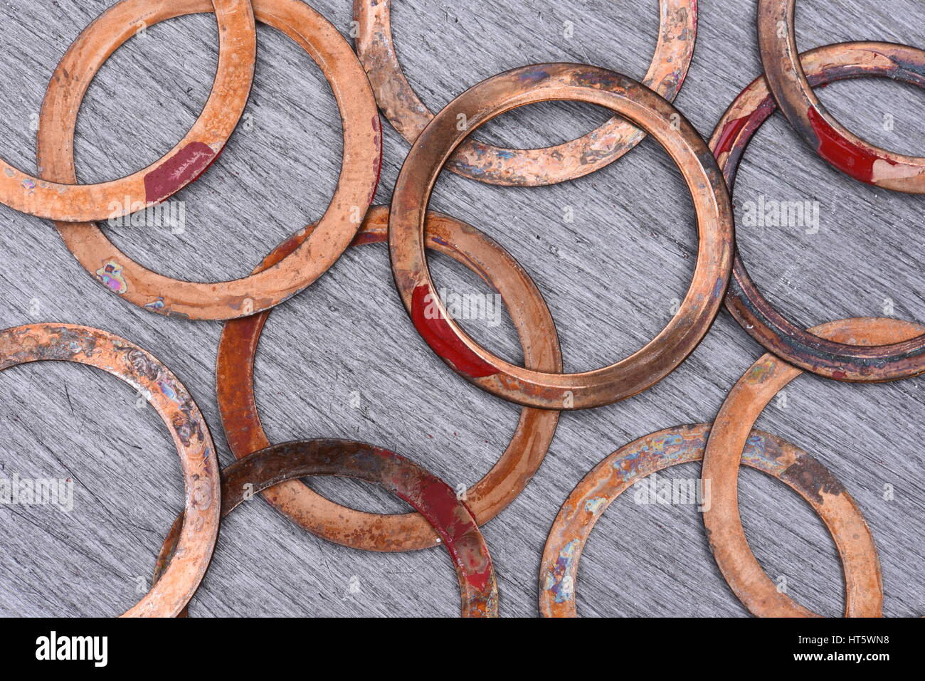 Old Copper Washers on Metal Background, Top View Stock Photo - Alamy