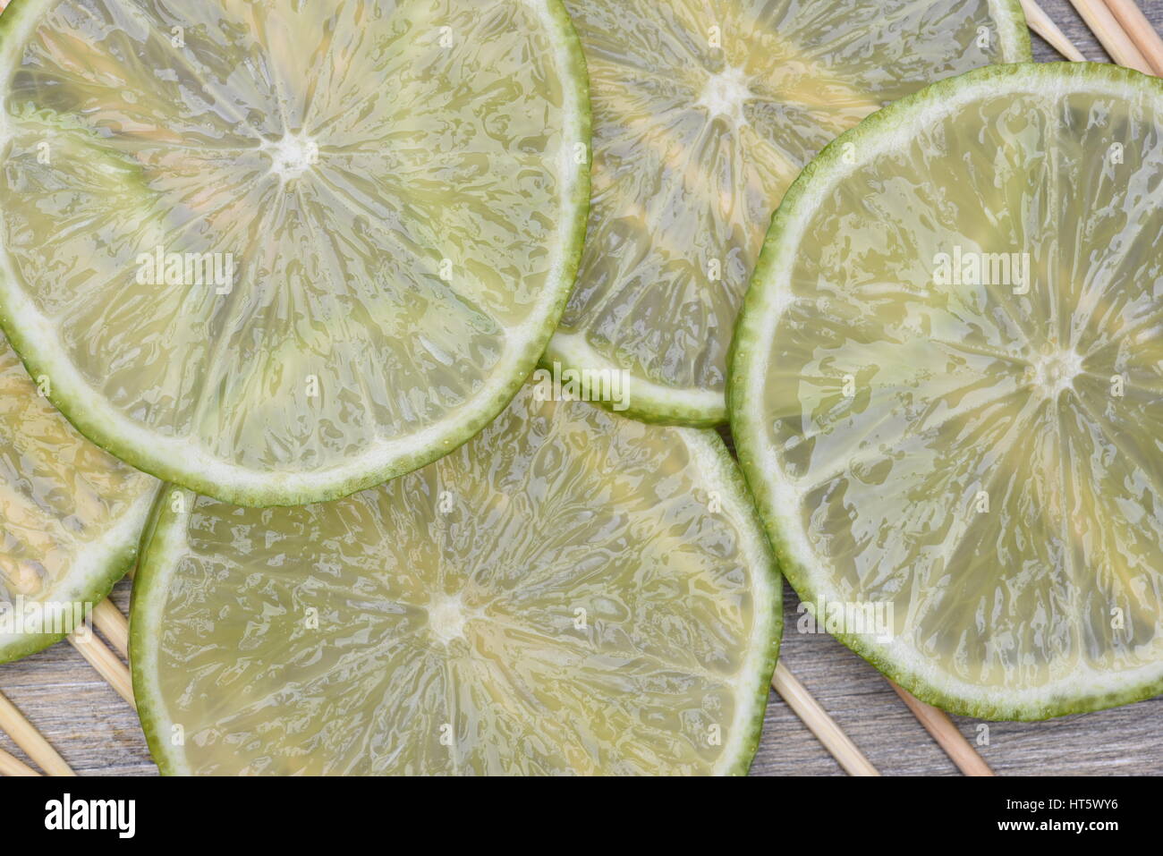 Fresh fruit slices lime top view Stock Photo - Alamy