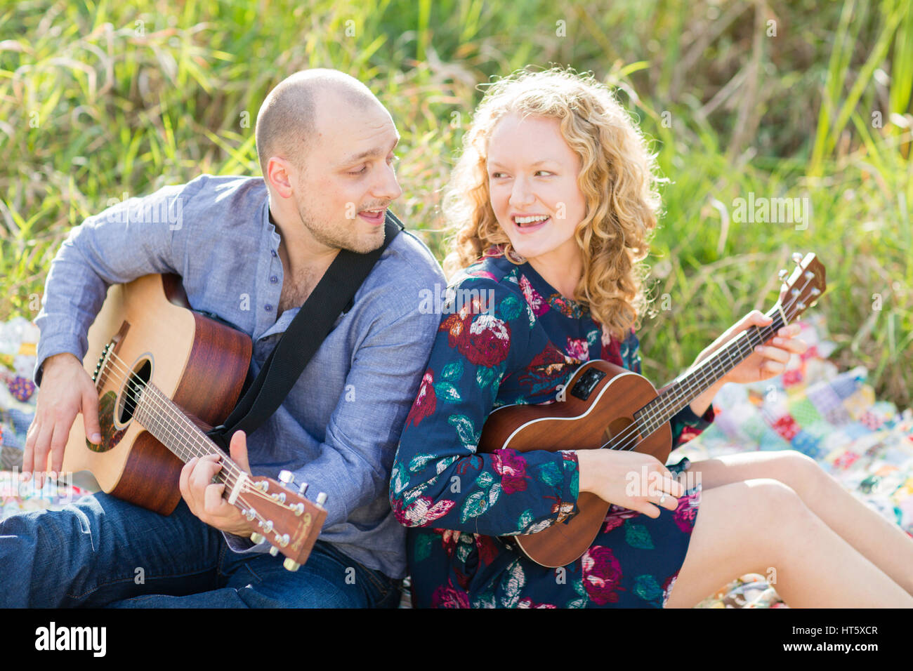 Music Lovers in a Field Stock Photo - Alamy