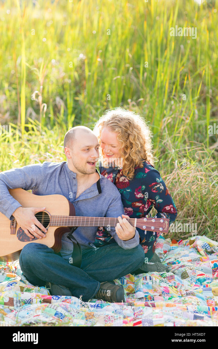 Music Lovers in a Field Stock Photo - Alamy