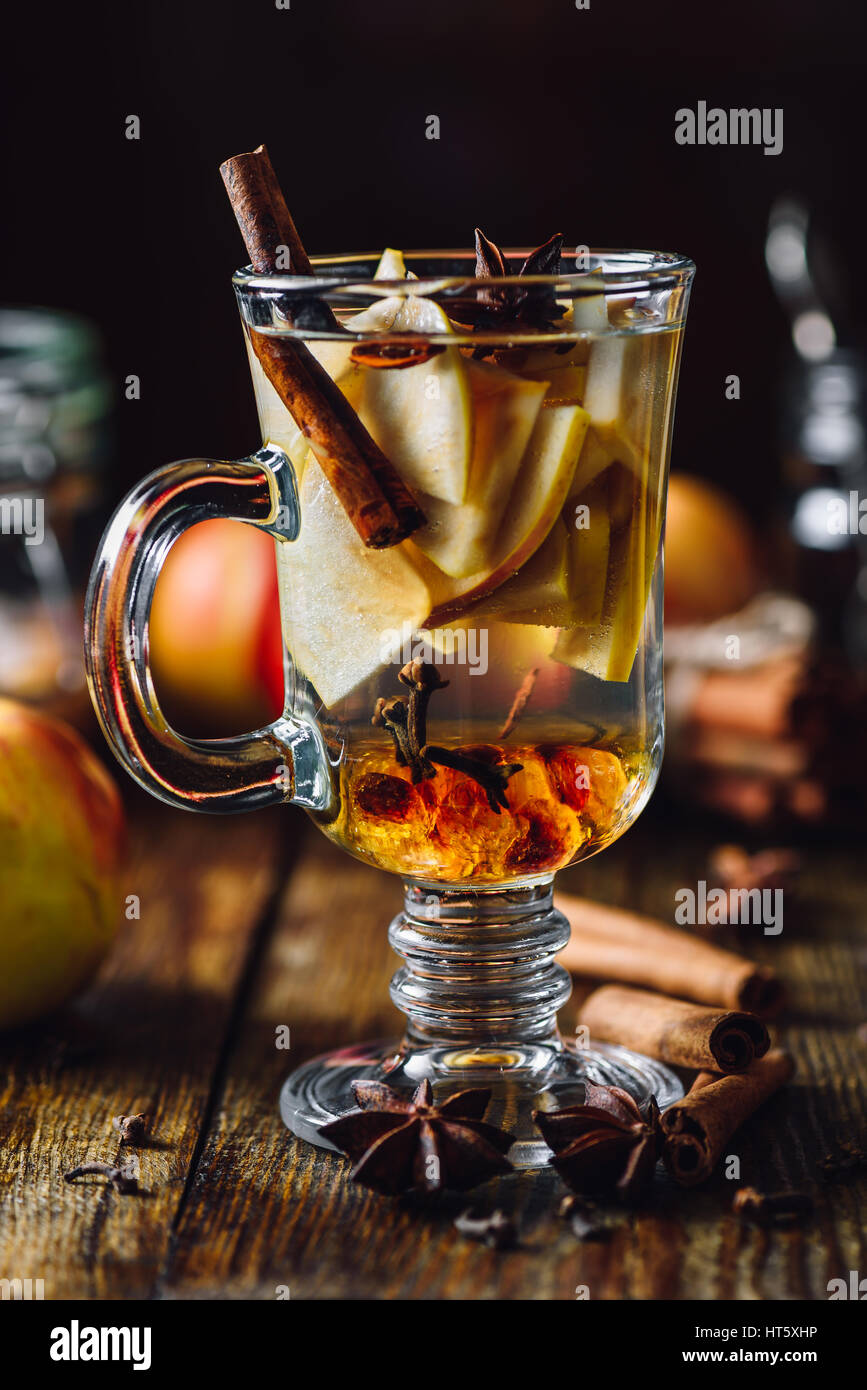 Hot Spiced Beverage with Sliced Apples and Different Condiment Stock ...
