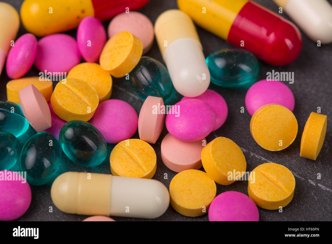 different tablets pills capsule heap mix therapy drugs Stock Photo - Alamy