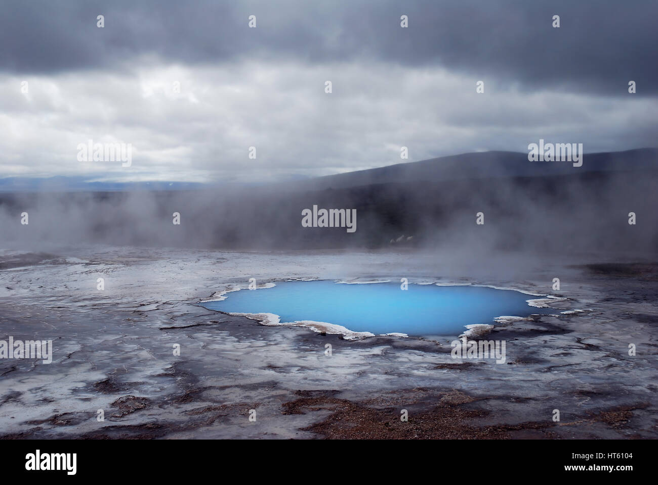 Iceland Krafla geothermal site, hot steam pool as a blue eye in the ...