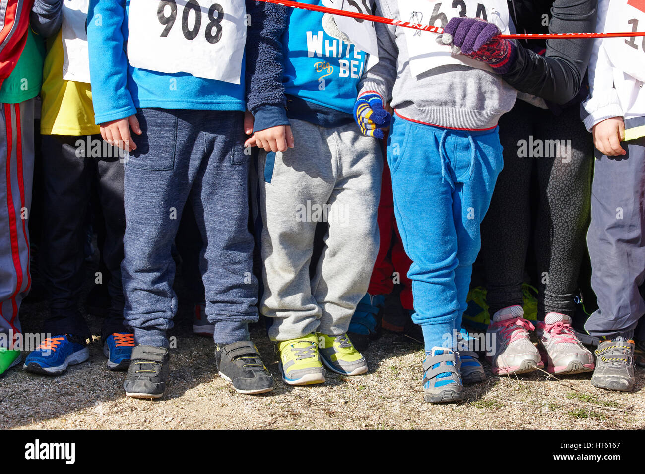 Children athletics runner on a cross country race. Start. Horizontal ...