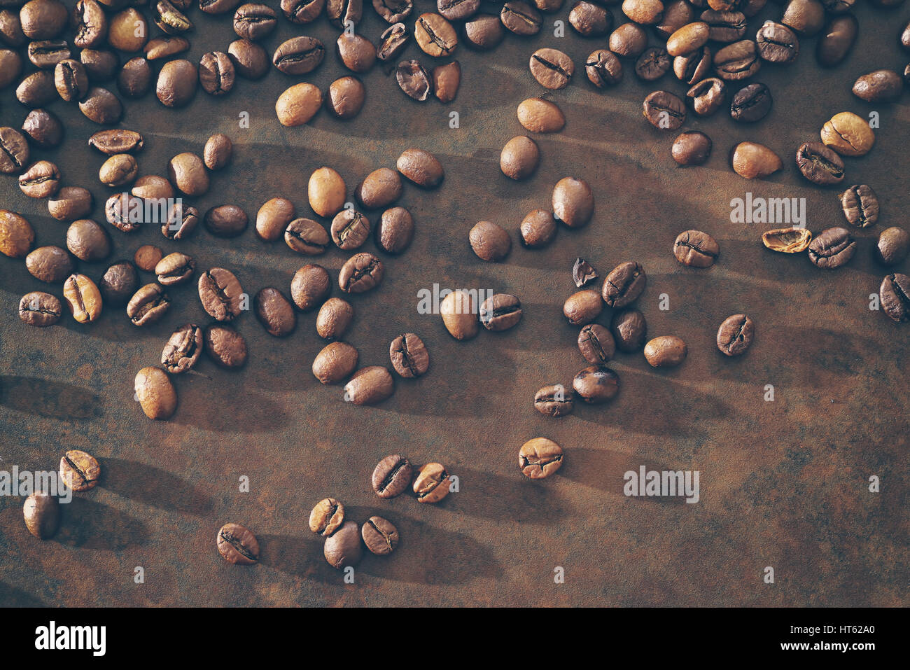 Coffee beans on stone table/coffee background Stock Photo - Alamy