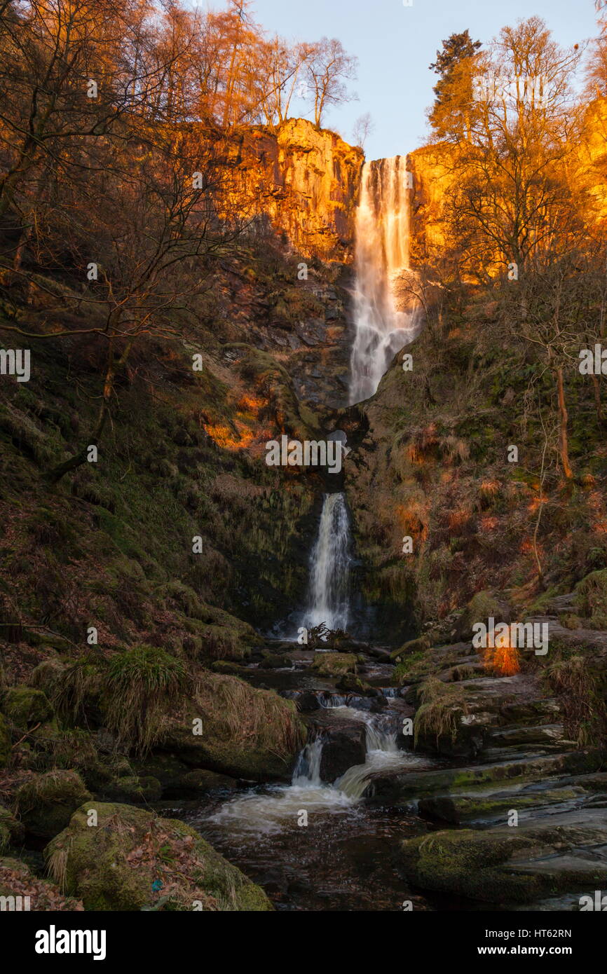 Pistyll Rhaeadr waterfall is bathed in early morning golden light Stock ...