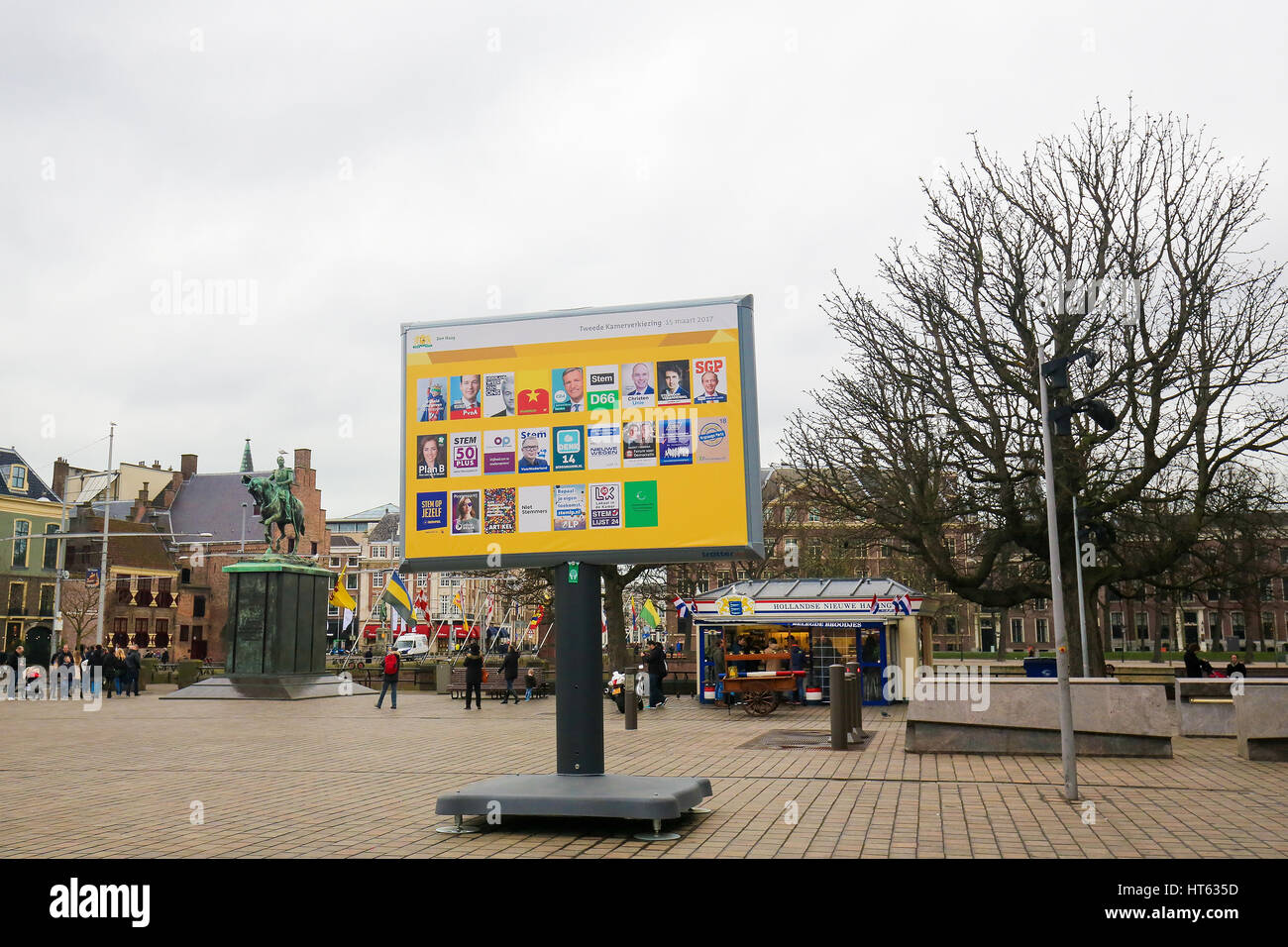 Board with the election posters of all Dutch political parties at the ...