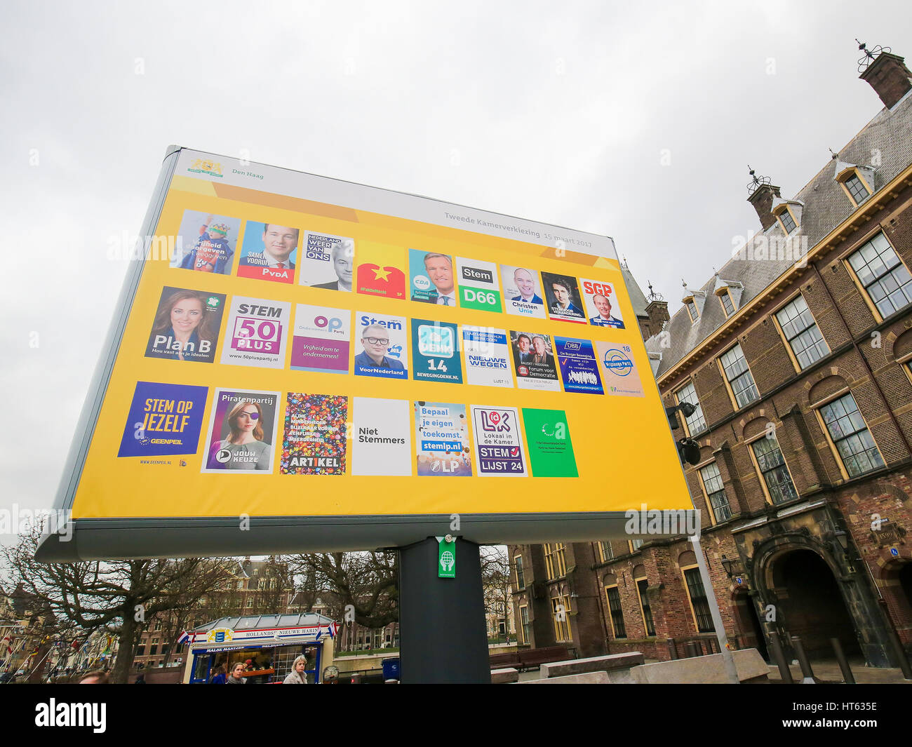 Board with the election posters of all Dutch political parties at the ...