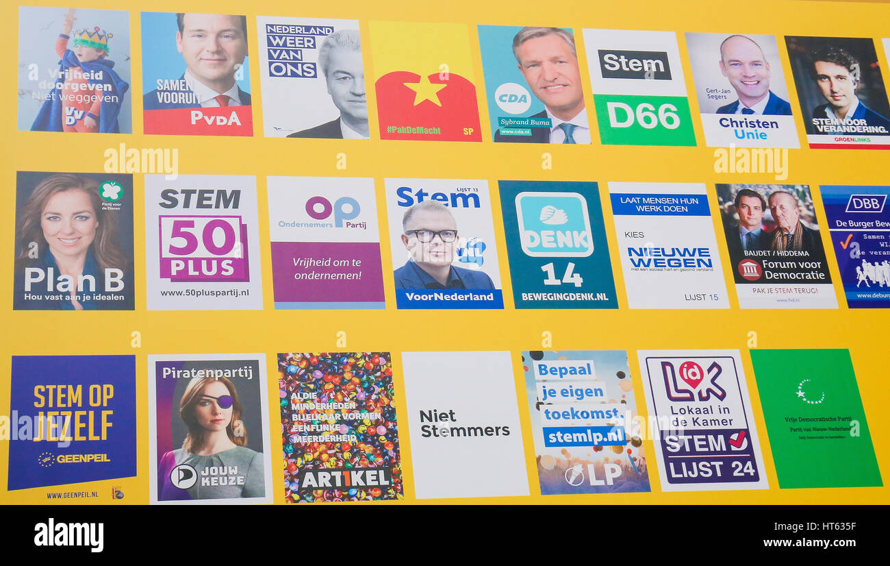 Board with the election posters of all Dutch political parties at the ...