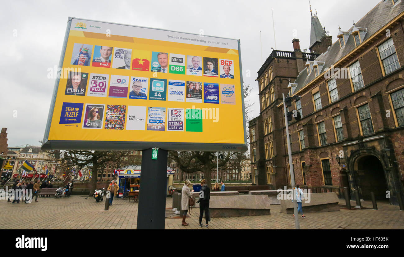Board with the election posters of all Dutch political parties at the ...