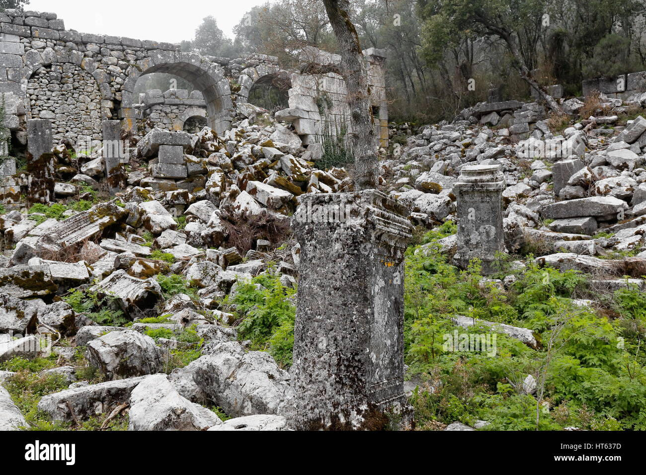 Fallen columns-stone masonry arches-gymnasium and bath complex ruins of ...