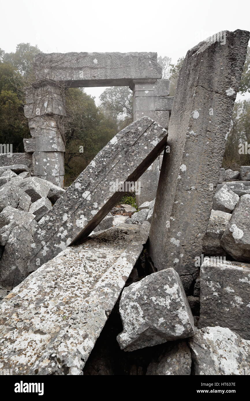 Fallen columns-ruins of doors-buildings in the area of the agora in ...