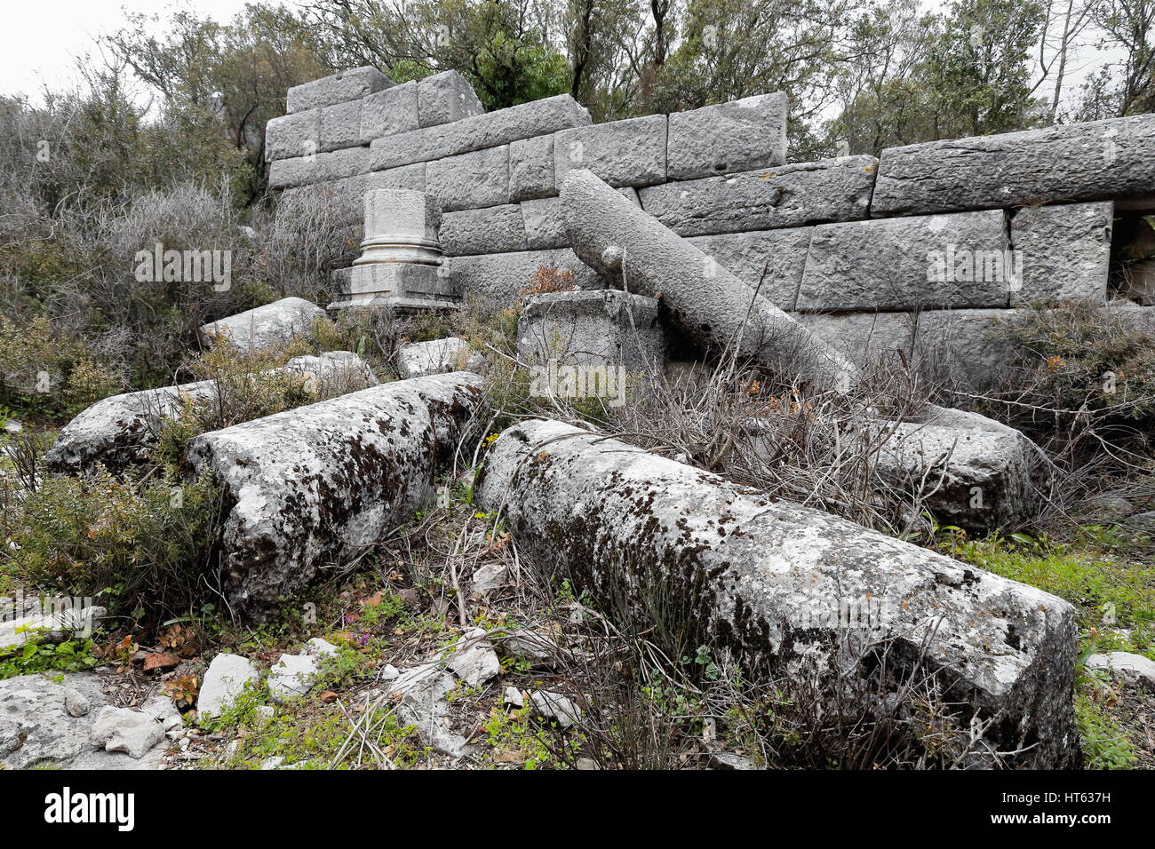 Fallen columns-ruins of walls-buildings in the area of the agora in ...