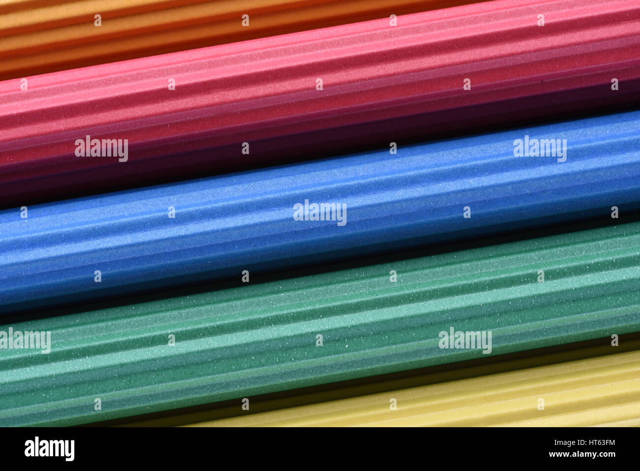Corrugated colorful paper roll Stock Photo - Alamy