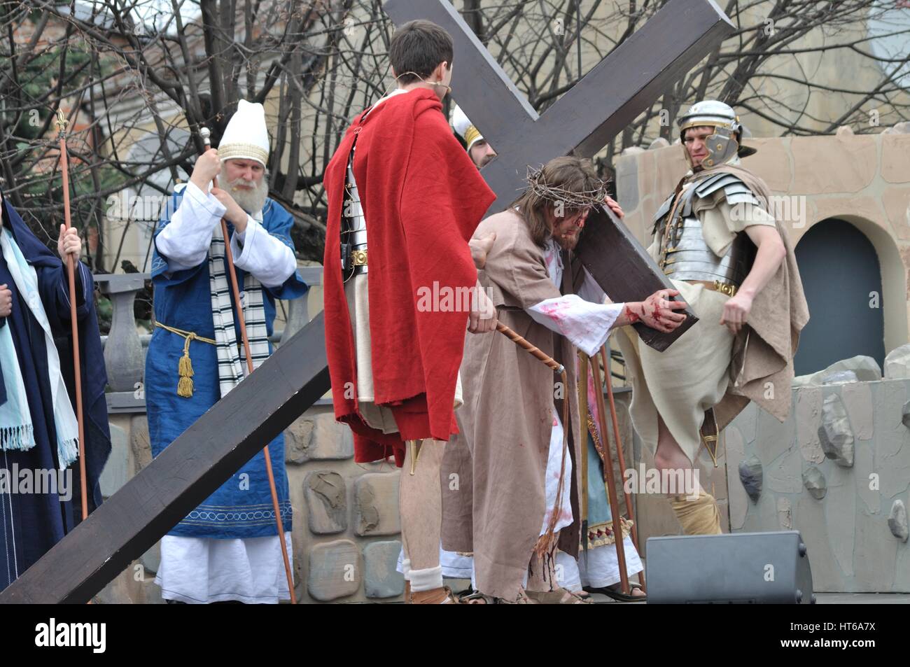 Jesus carrying his cross, on the way to his crucifixion, during the ...