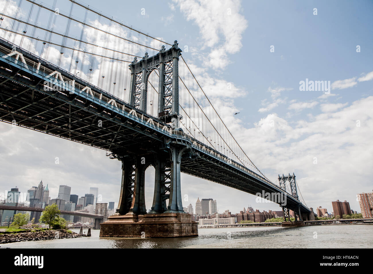 The Manhattan Bridge is a suspension bridge that crosses East River ...