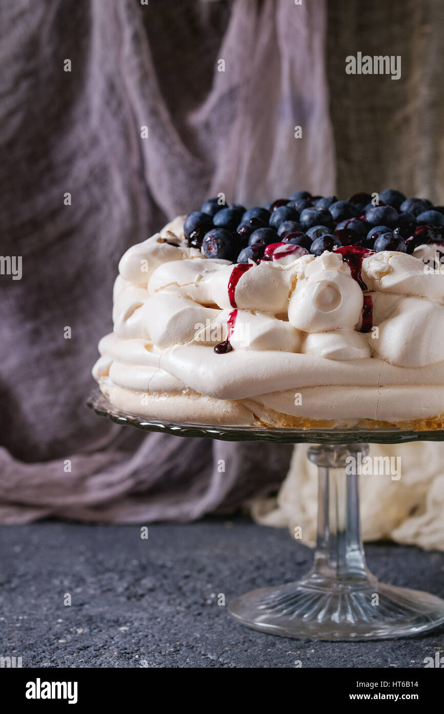 Homemade meringue cake Pavlova with whipped cream, fresh blueberries ...
