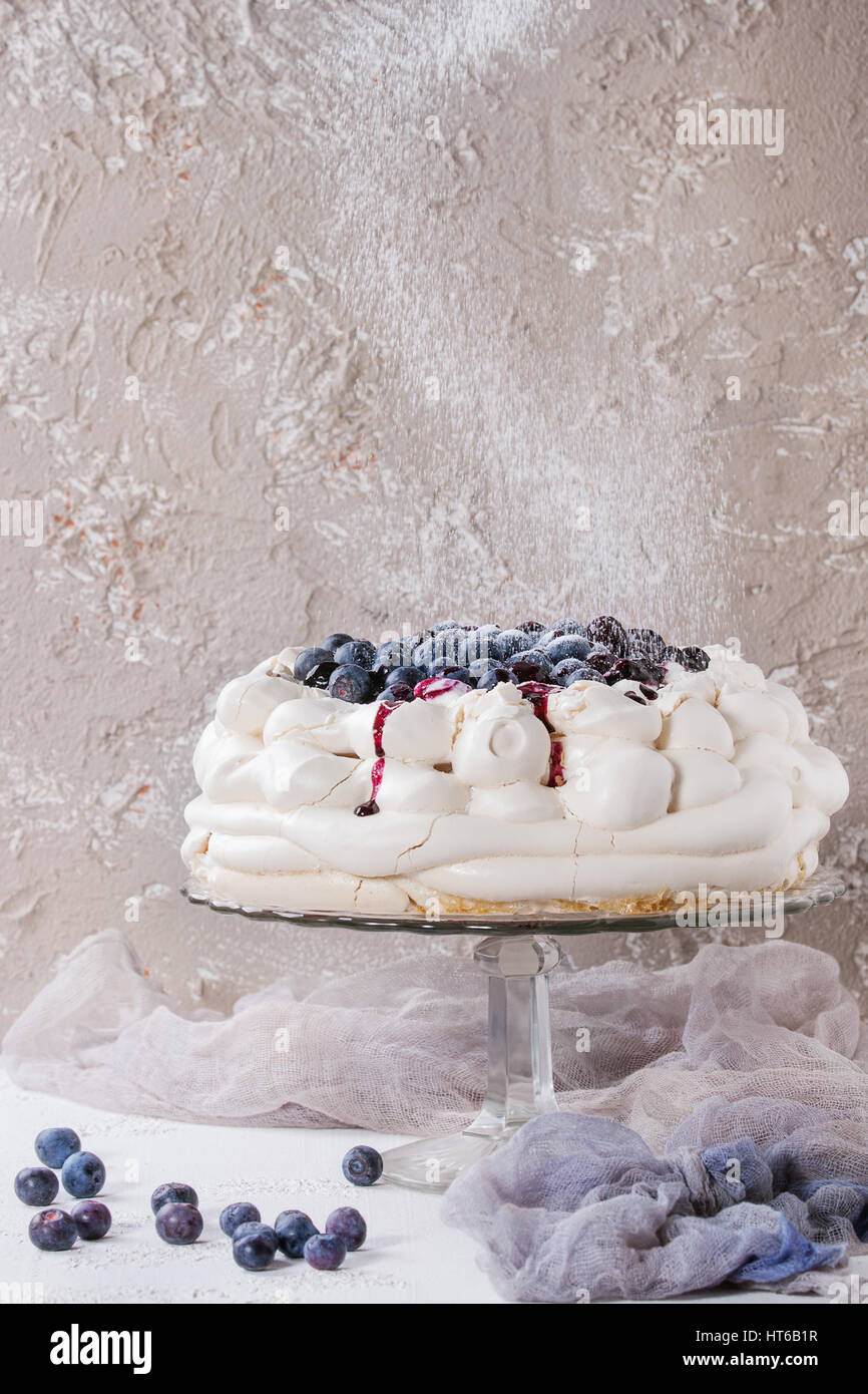 Homemade meringue cake Pavlova with whipped cream, fresh blueberries ...
