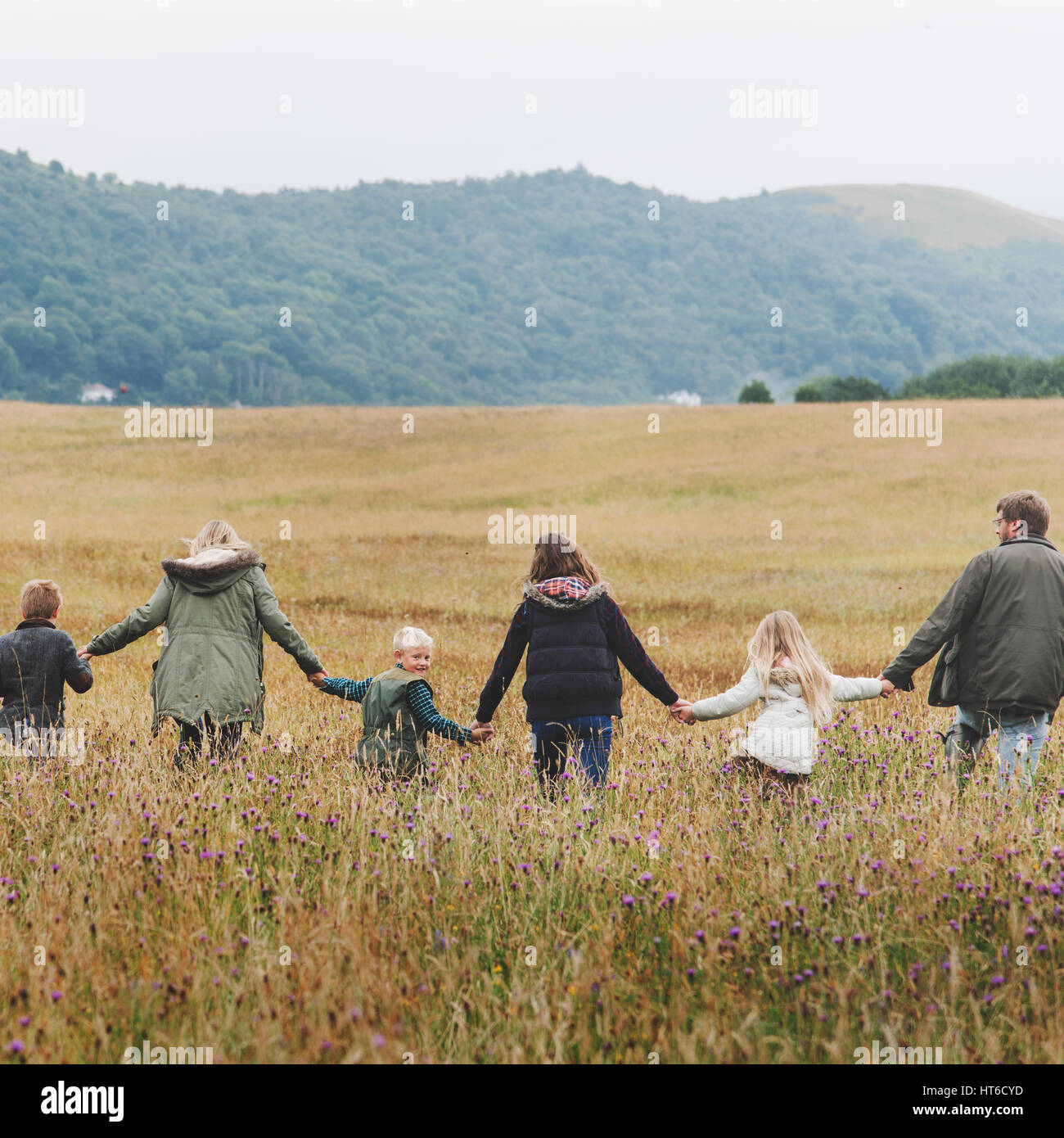 Family Walking Field Nature Togetherness Concept Stock Photo - Alamy