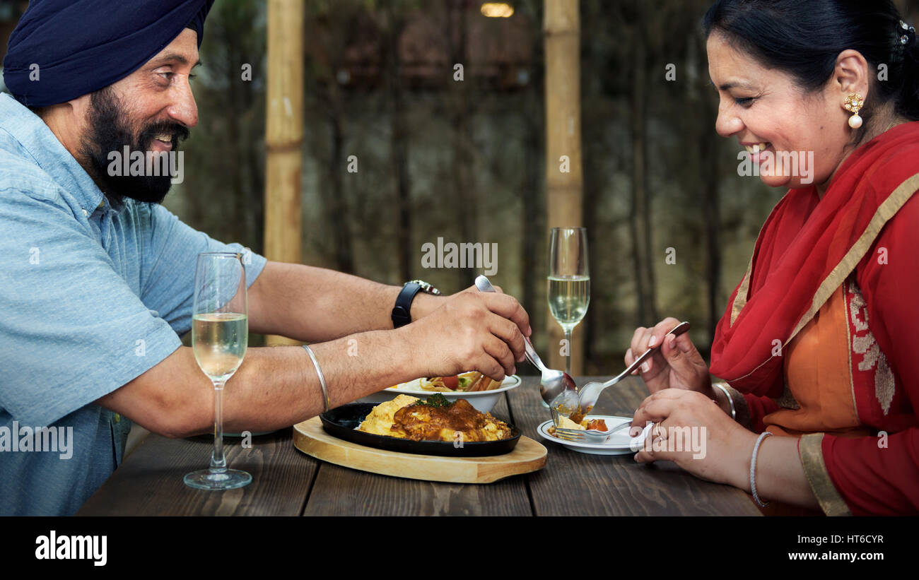Indian couple dining table hi-res stock photography and images - Alamy