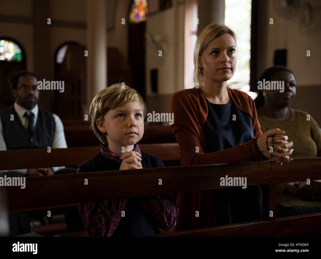 Catholic church pew family hi-res stock photography and images - Alamy