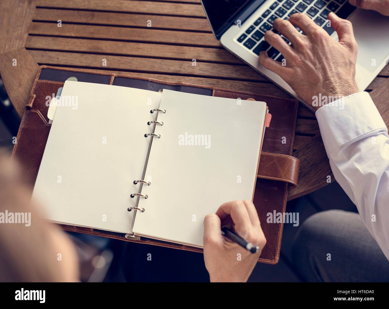 Businesspeople Men Women Notebook Work Stock Photo - Alamy