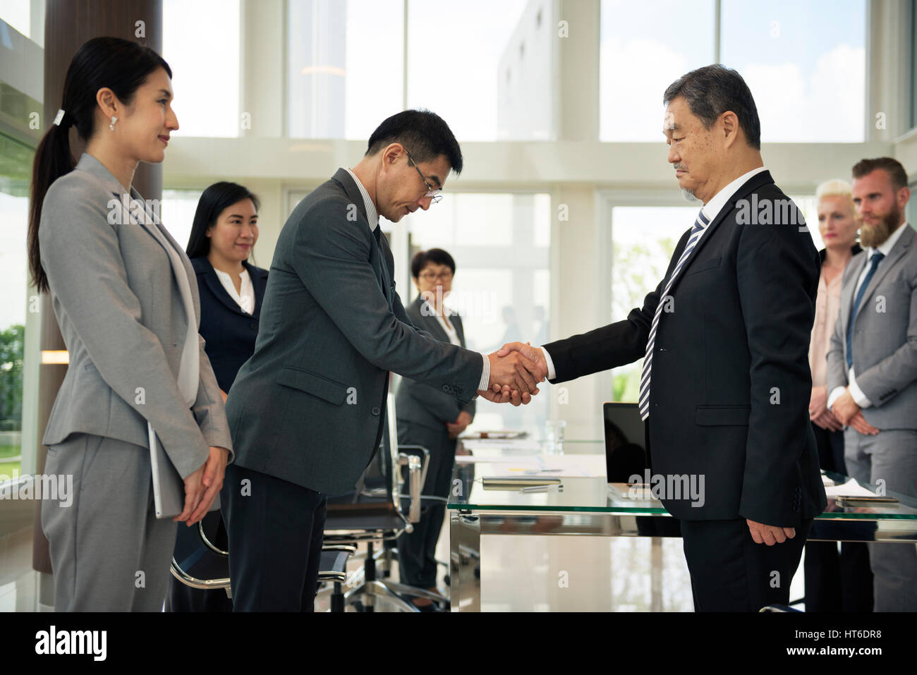 Business Partners Introductionary Handshake Bow Stock Photo - Alamy