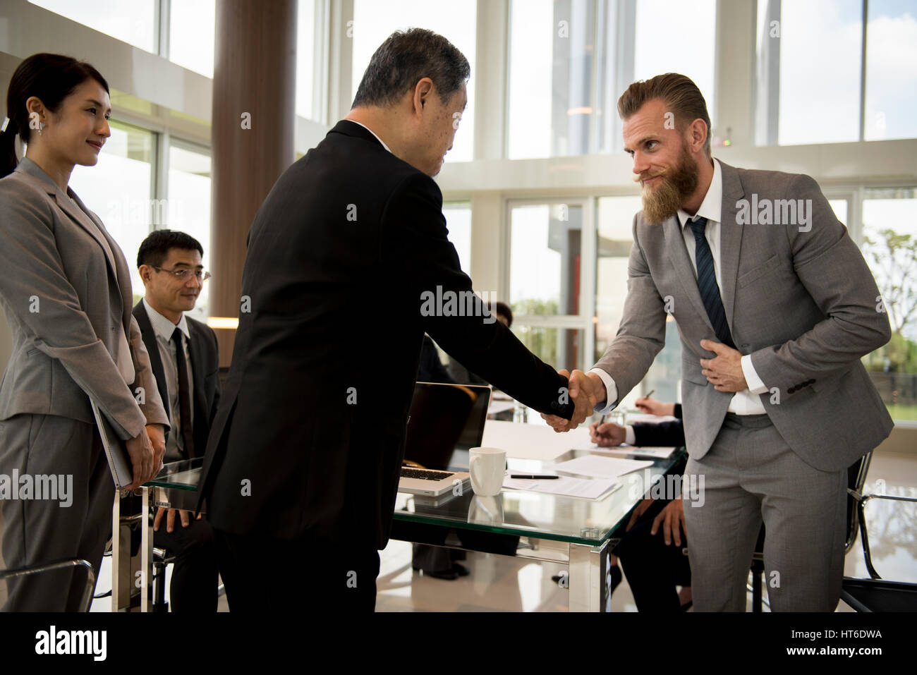 Business Partners Introductionary Handshake Bow Stock Photo - Alamy