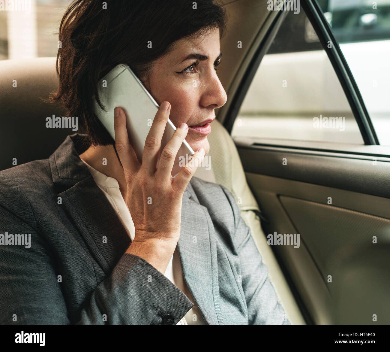Businesswoman Talking Using Phone Car Inside Stock Photo - Alamy