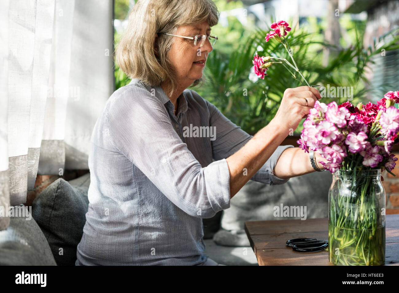Hobby Lady Mature Leisure Flower Stock Photo - Alamy