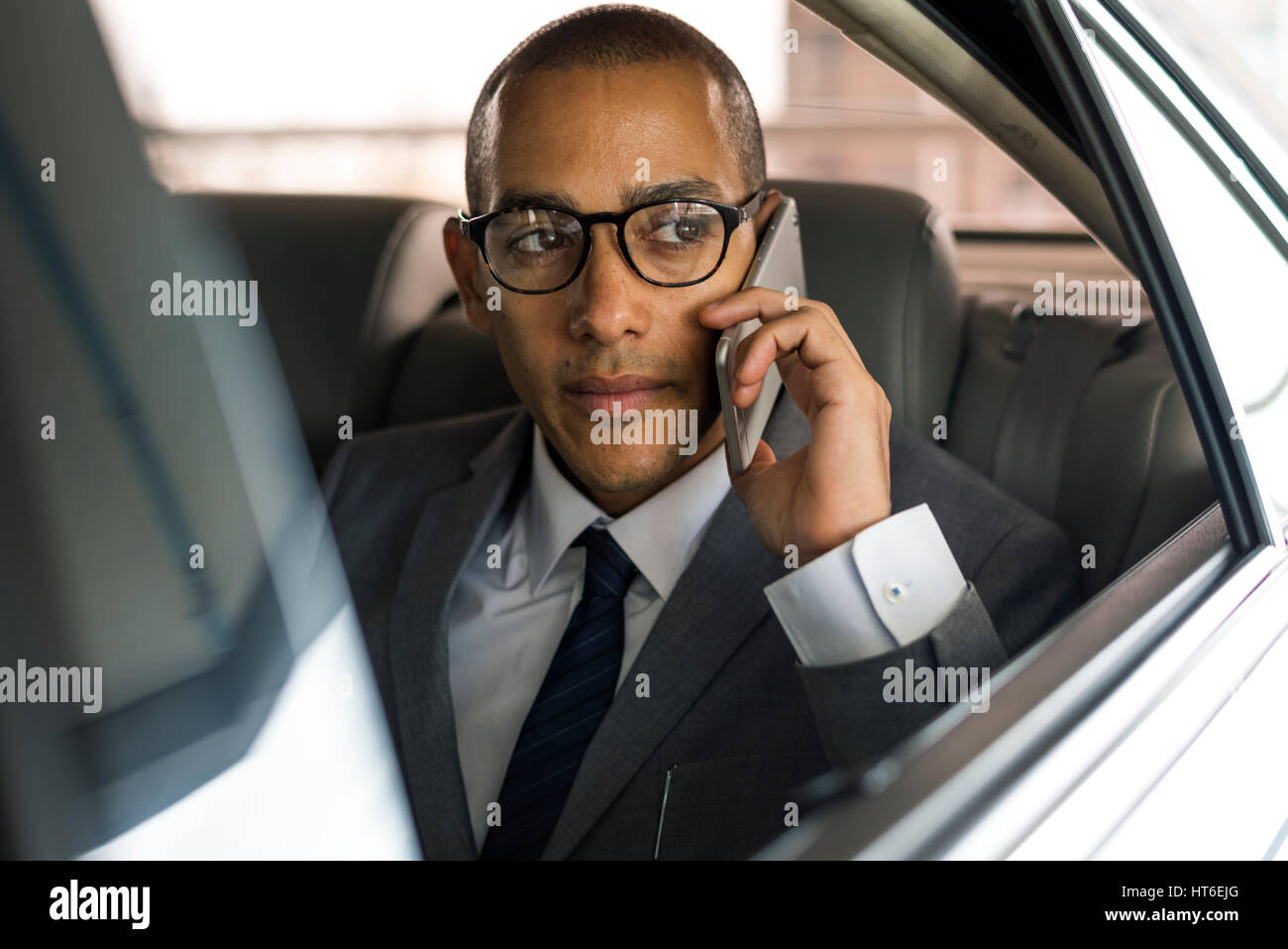 Businessman Use Mobile Talk Car Stock Photo - Alamy