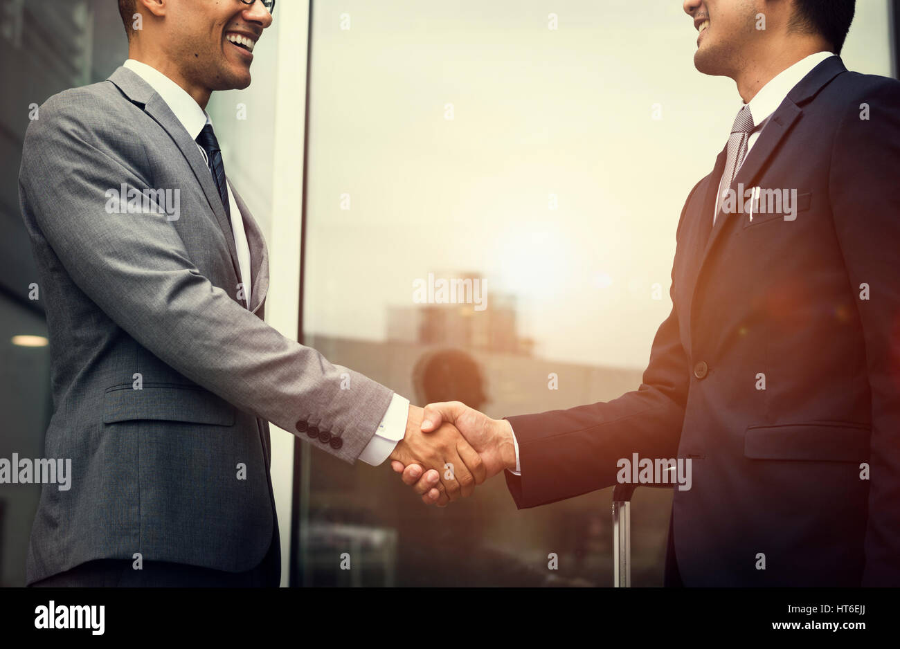 Multiethnic friends shake hand hi-res stock photography and images - Alamy