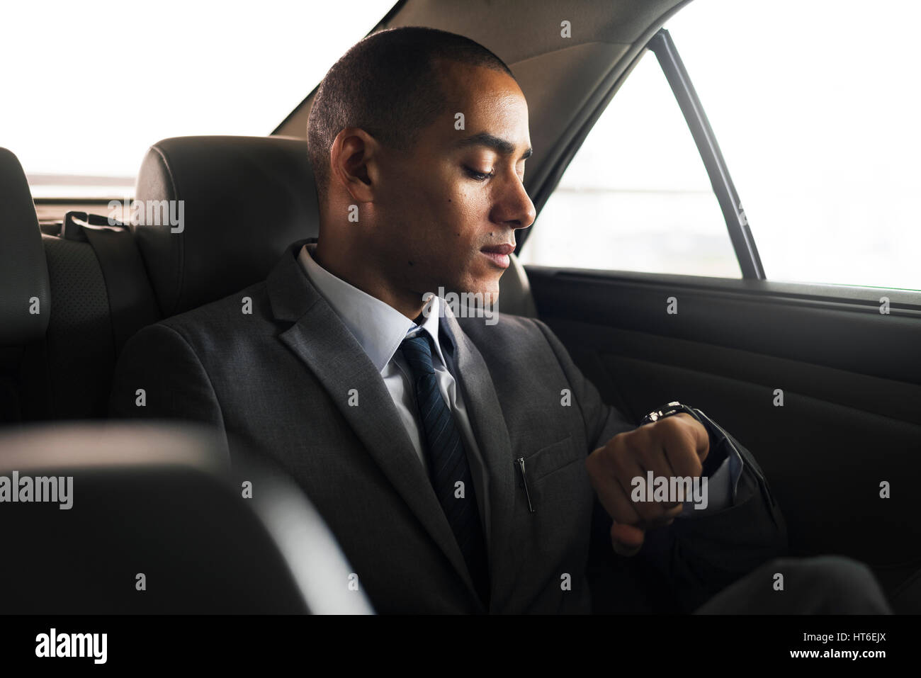 Businessman Sit Inside Car Waiting Stock Photo - Alamy
