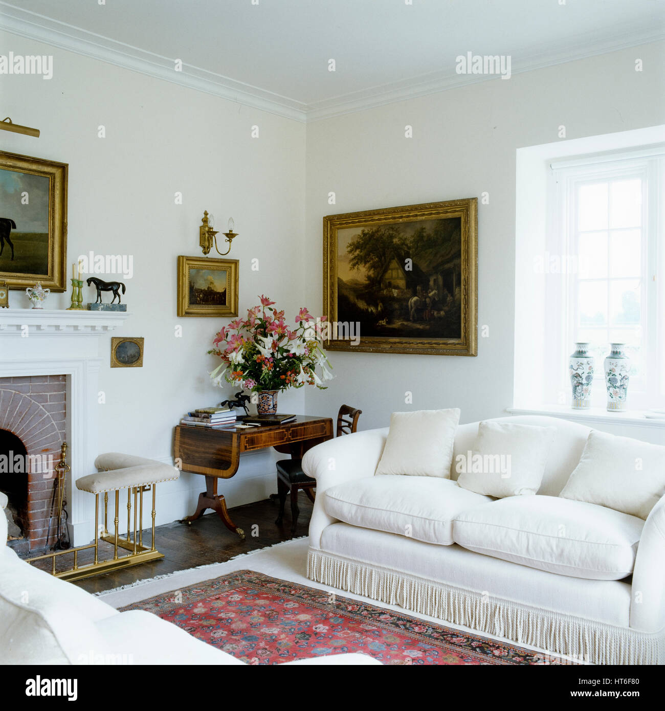 Living room with patterned rug Stock Photo - Alamy