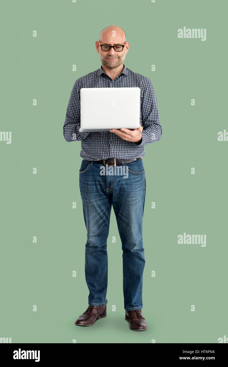 Caucasian Man Using Laptop Stock Photo - Alamy