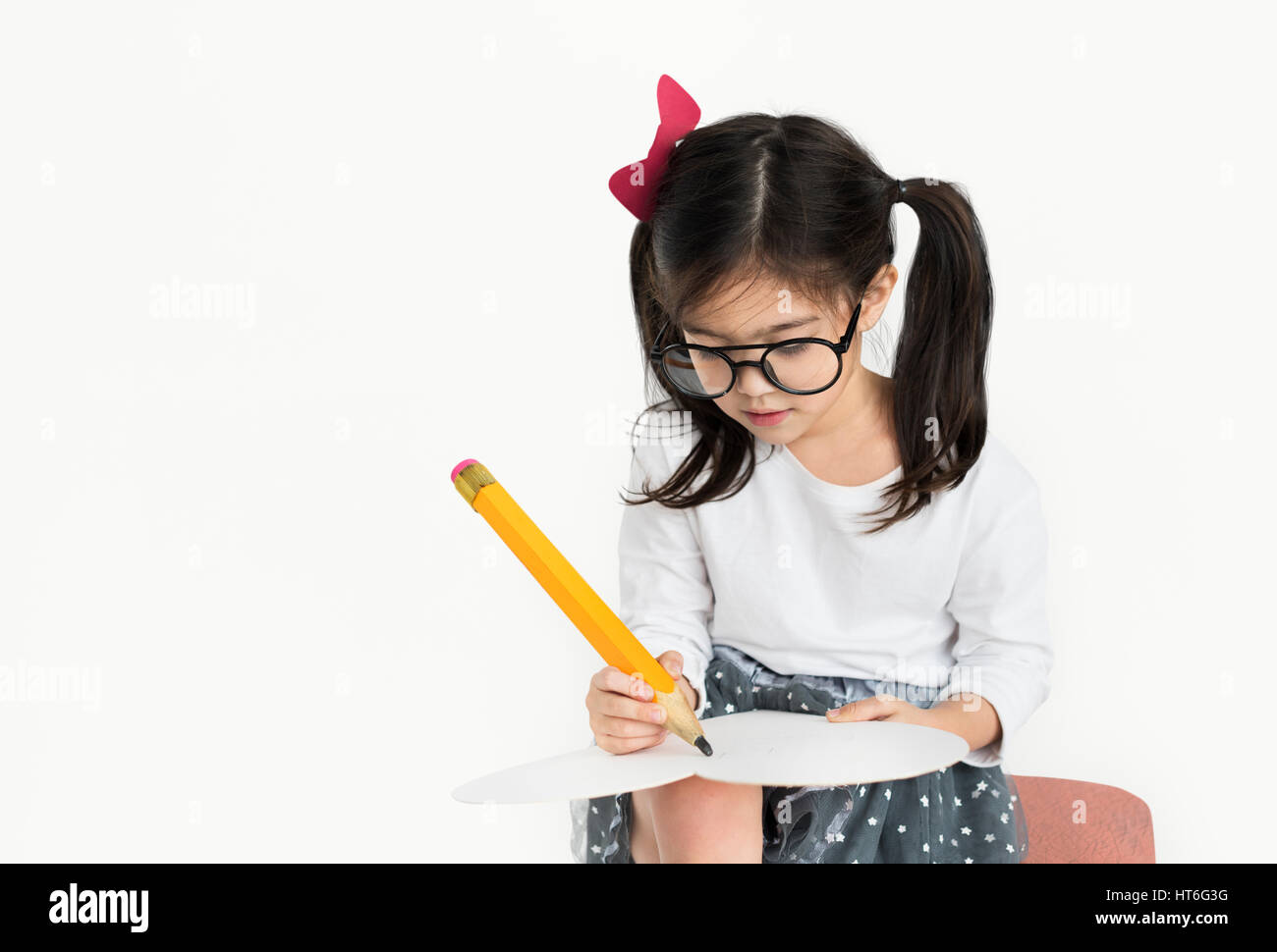 Little Girl Big Pencil Drawing Concept Stock Photo - Alamy