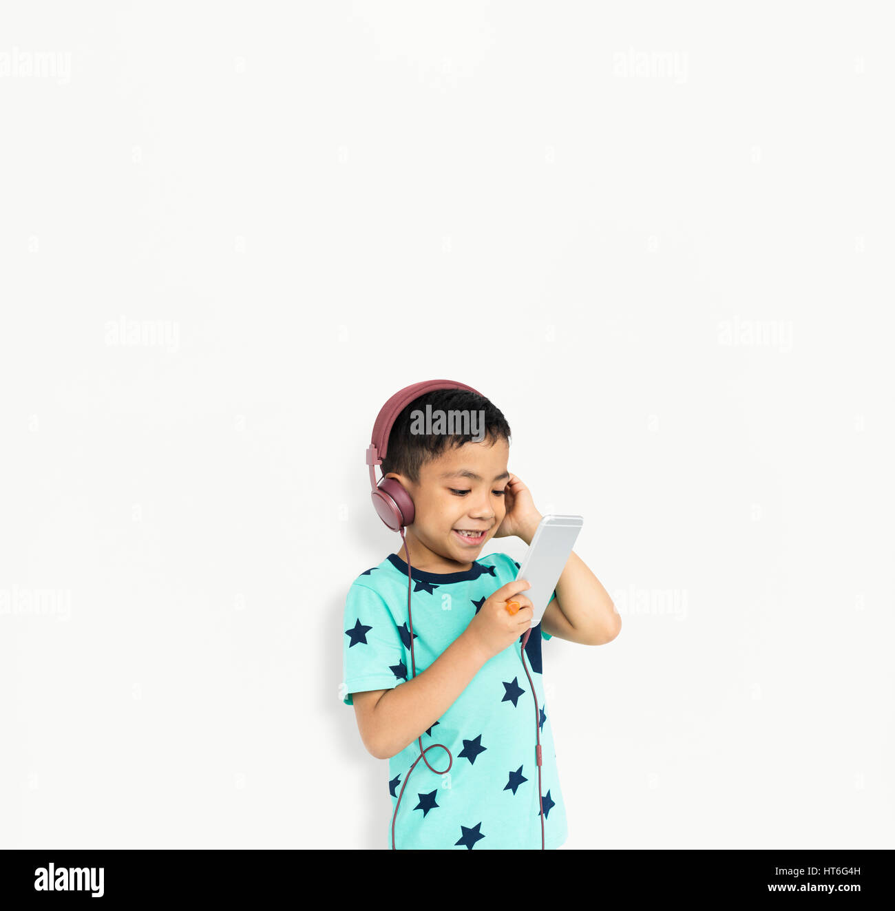 Little Boy Listen Music Smile Studio Stock Photo - Alamy