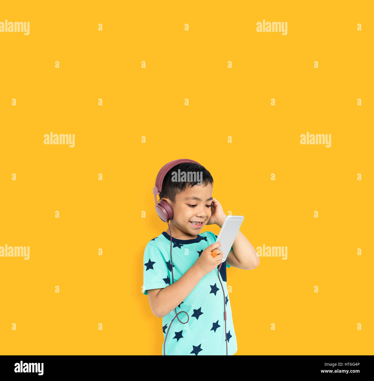 Little Boy Listen Music Smile Studio Stock Photo - Alamy