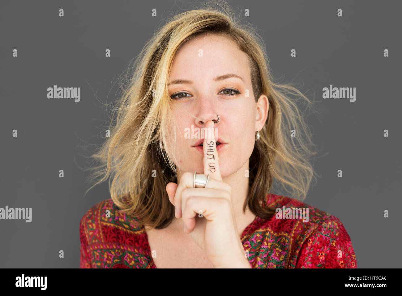 Caucasian Lady Hand Gesture Shut Up Stock Photo - Alamy