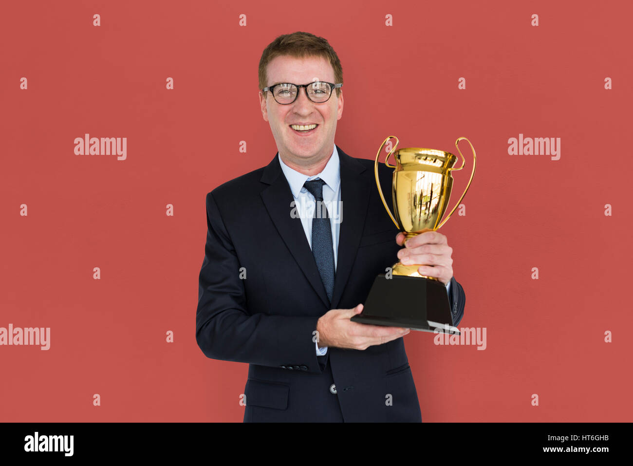 Caucasian Business Man Award Trophy Stock Photo - Alamy