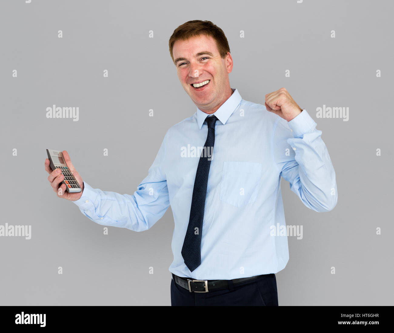 Caucasian Business Man Calculator Smiling Stock Photo - Alamy