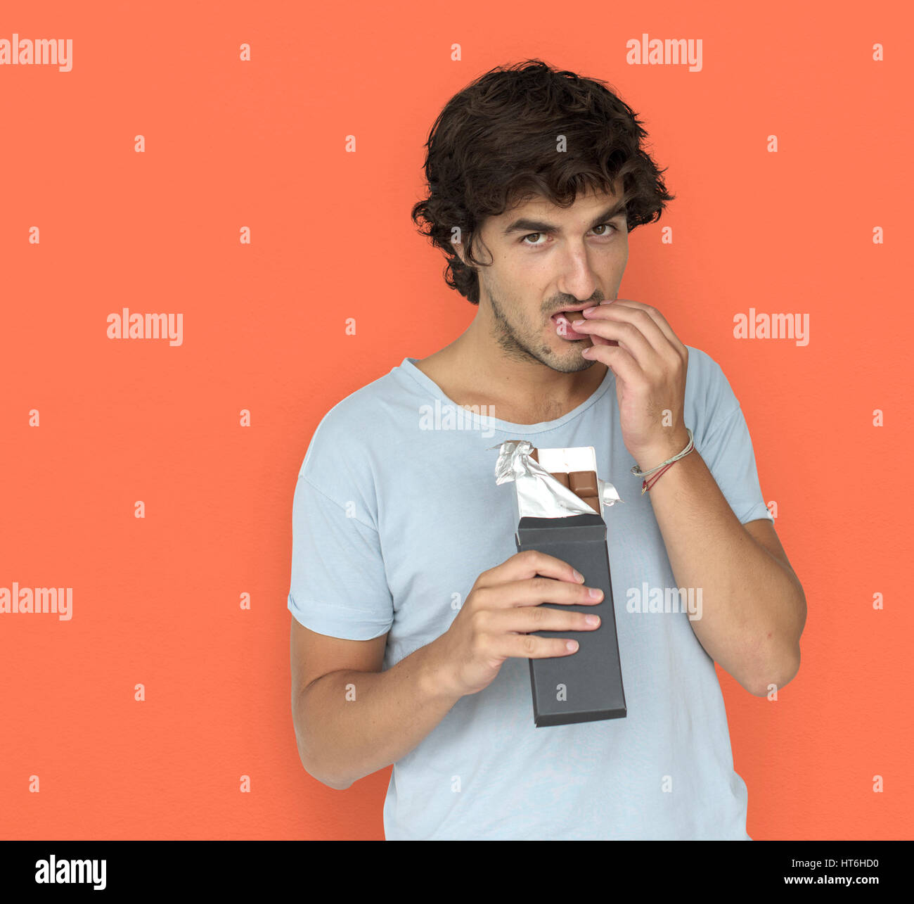 Man eating chocolate hi-res stock photography and images - Alamy