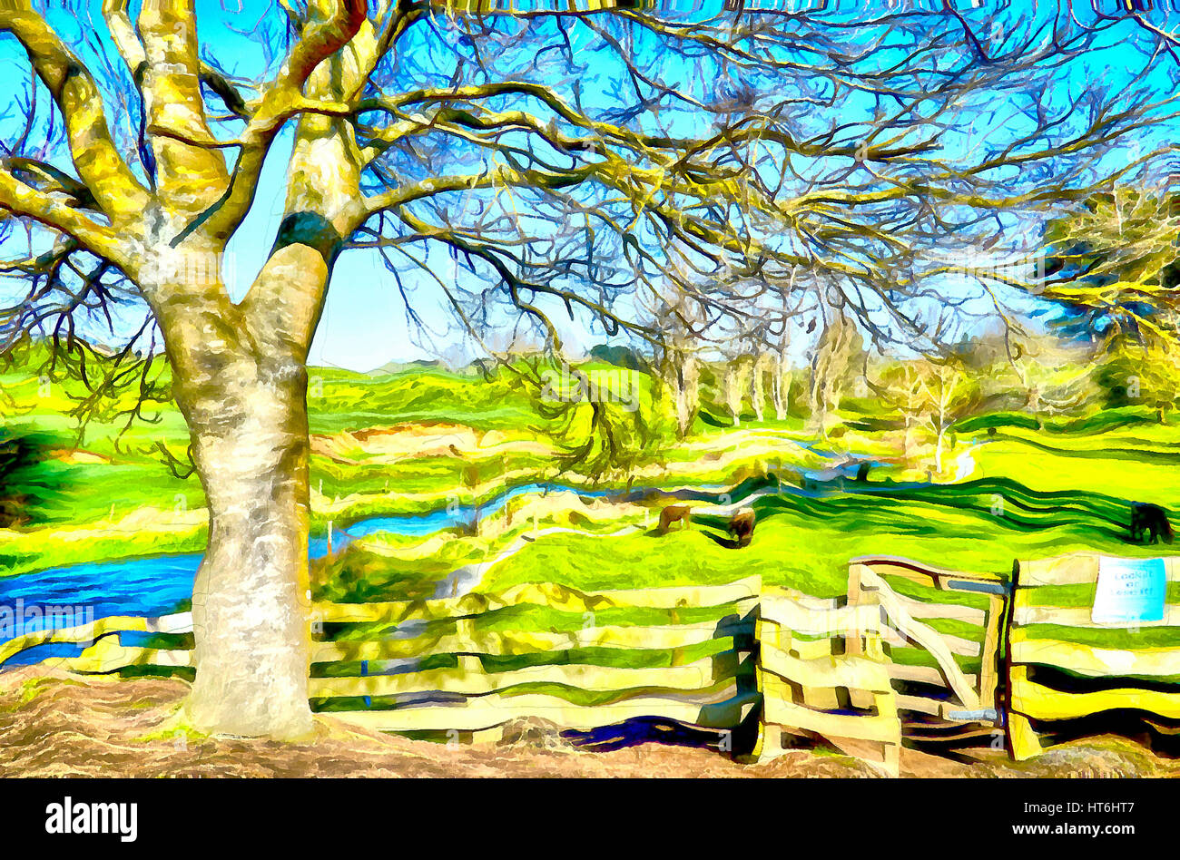 River flowing through a fenced meadow with a tree in the foreground ...