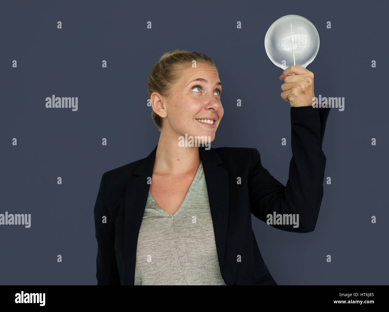 Caucasian Woman Business Light Bulb Stock Photo - Alamy