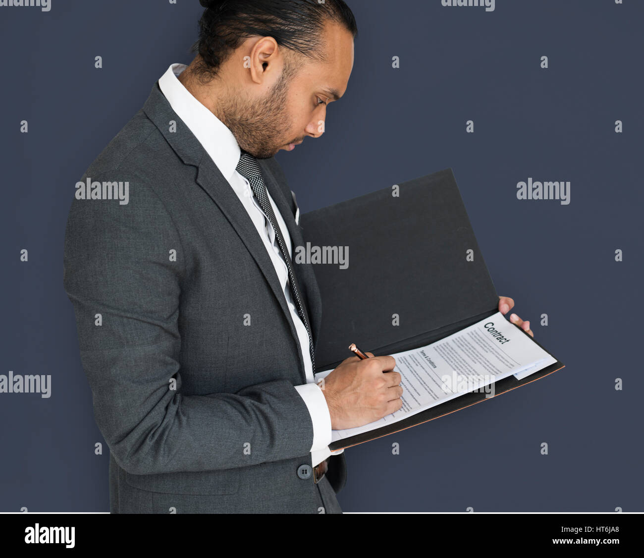 Indian Asian Man Signing Contract Stock Photo - Alamy