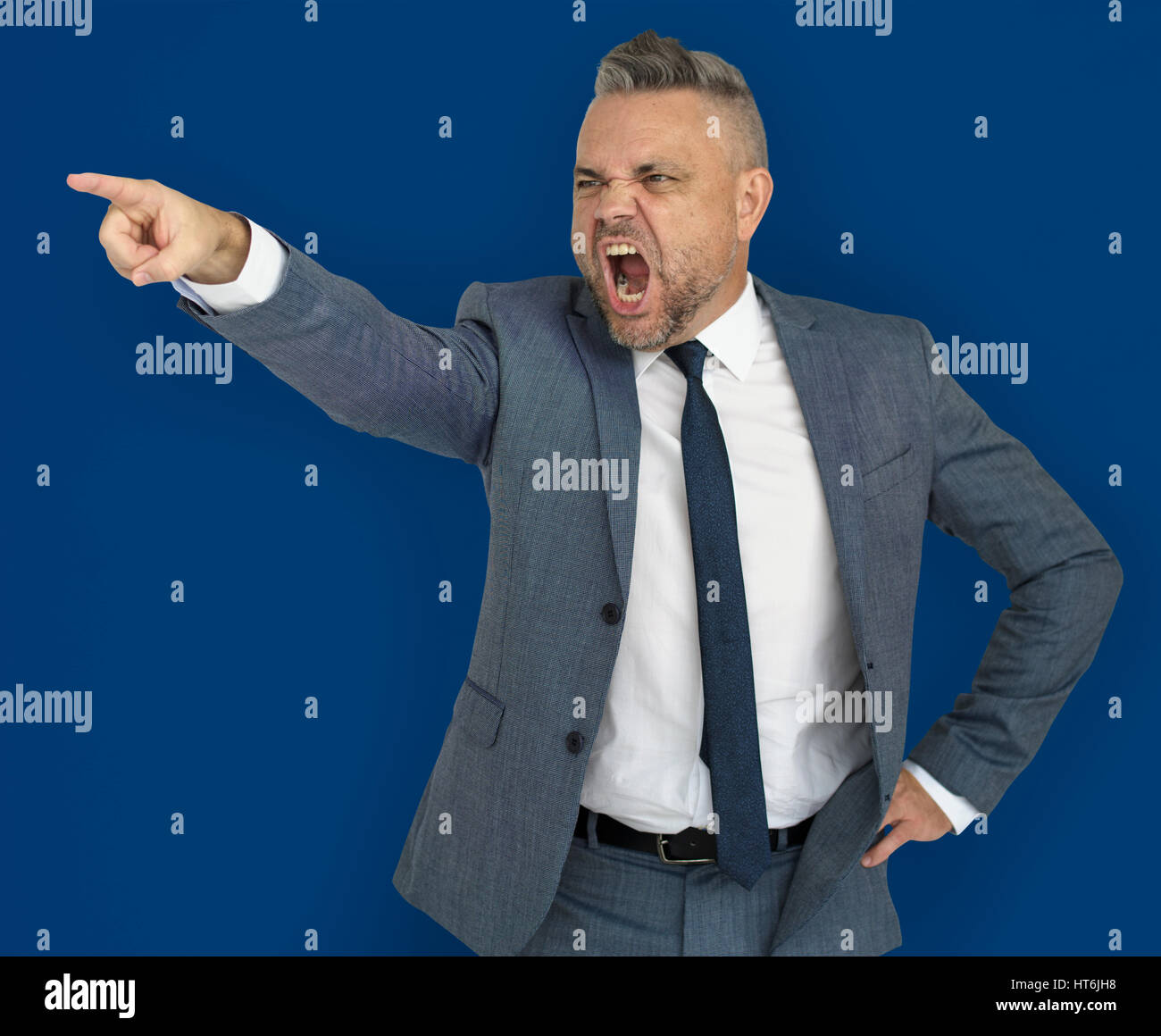 Caucasian Business Man Pointing Angry Stock Photo - Alamy