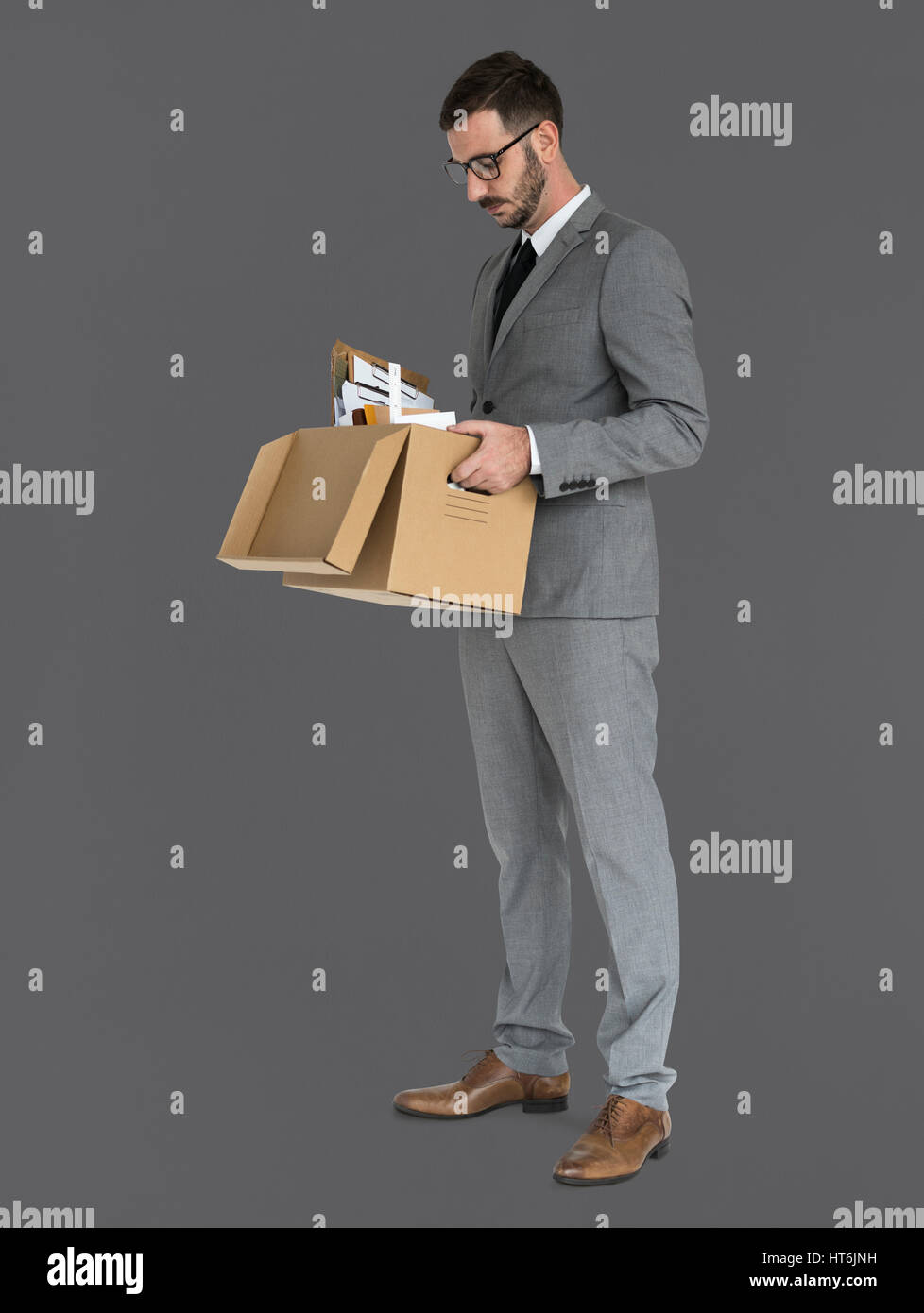 Caucasian Business Man Pack Up Retrenched Stock Photo - Alamy